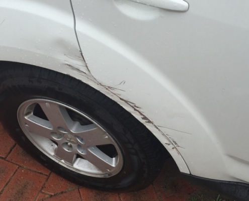 wheel and door damage - before